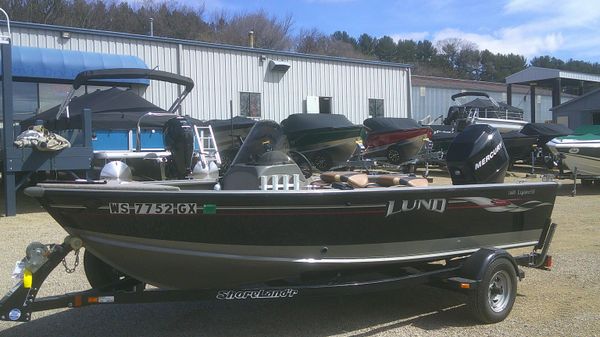 Pre-Owned Boats - The Dry Dock - Boats, Motors, Hoists and Docks